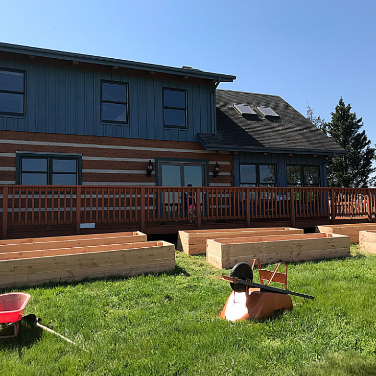 How to Build Hugelkultur Raised Garden Beds - Roots & Boots