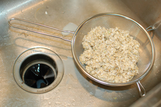 Straining-Soaked-Oats - Roots & Boots